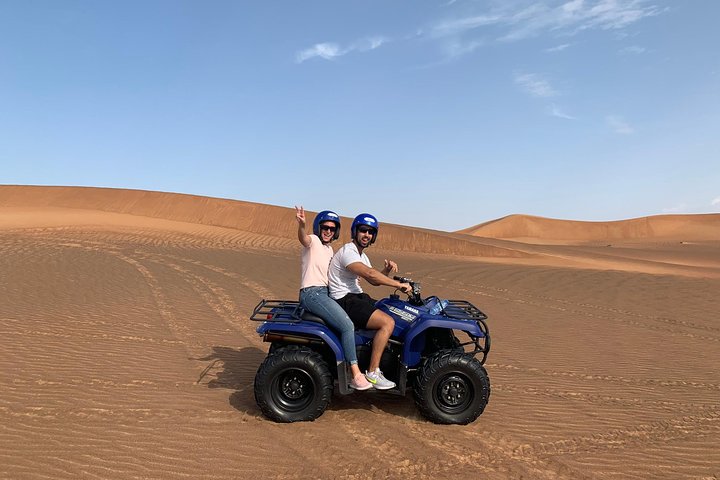 Dubai: Unique SUNSET Quad Bike Red Dunes Safari