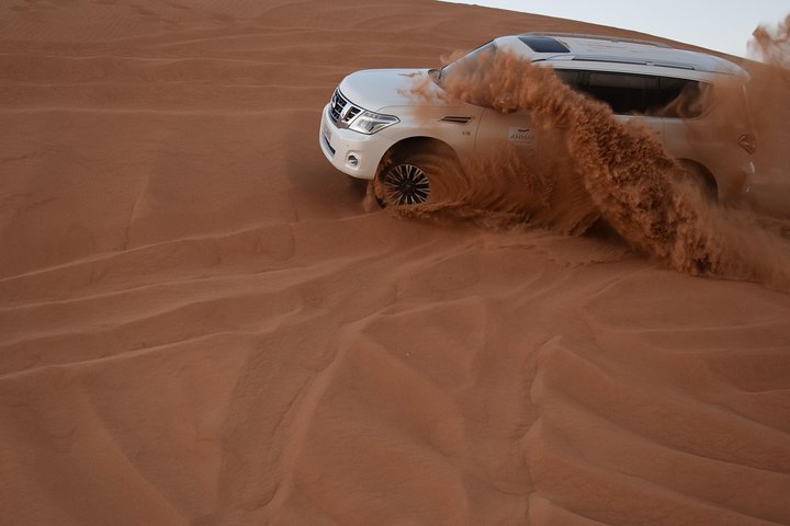 Dune Bashing with Quad Bike and Sand Boarding from Dubai